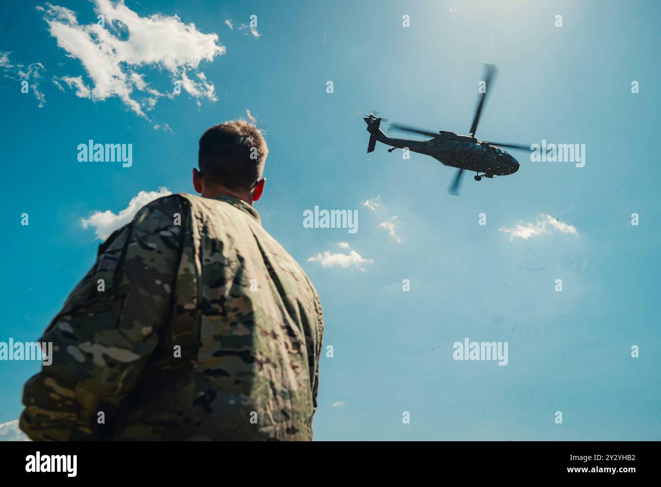 U.S. Army Green Beret from 1st Special Forces Group (Airborne) watches ...