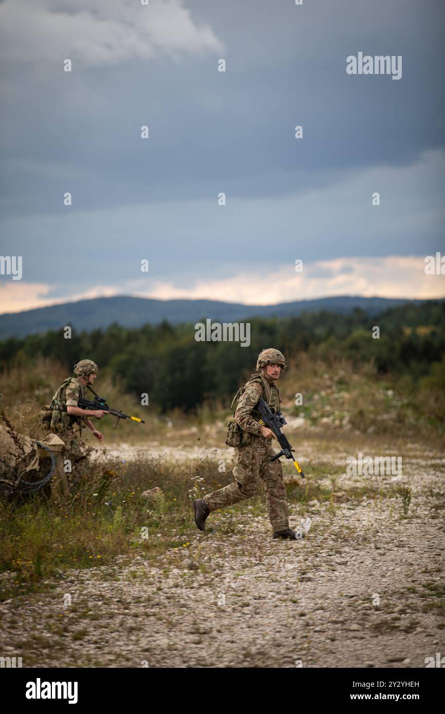 British soldiers react to contact with opposing forces during exercise ...