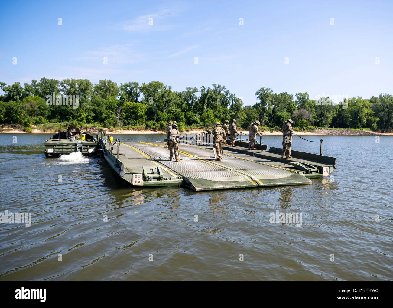 Soldiers with the 341st Multi-Role Bridging Company build a partial ...