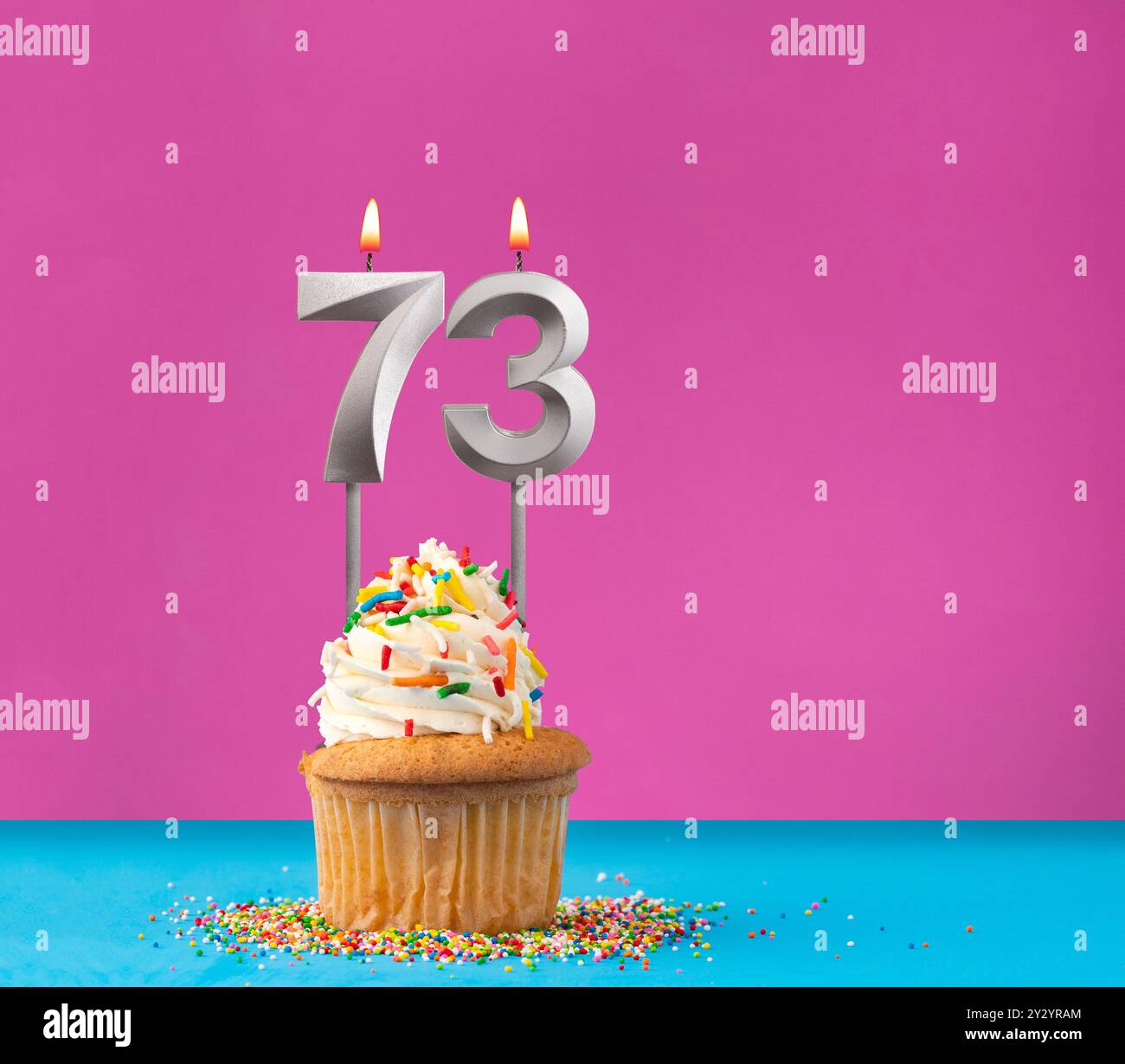 Cupcake with birthday candle number 73 - Anniversary card on blue and ...