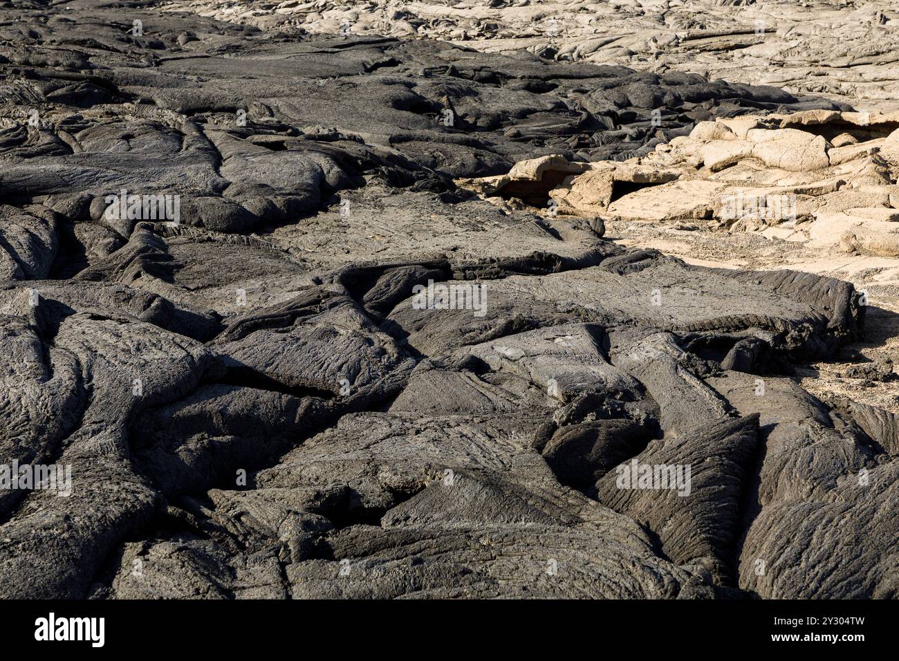Solified lava from Erta Ale volcano in Danakil Depression desert in ...