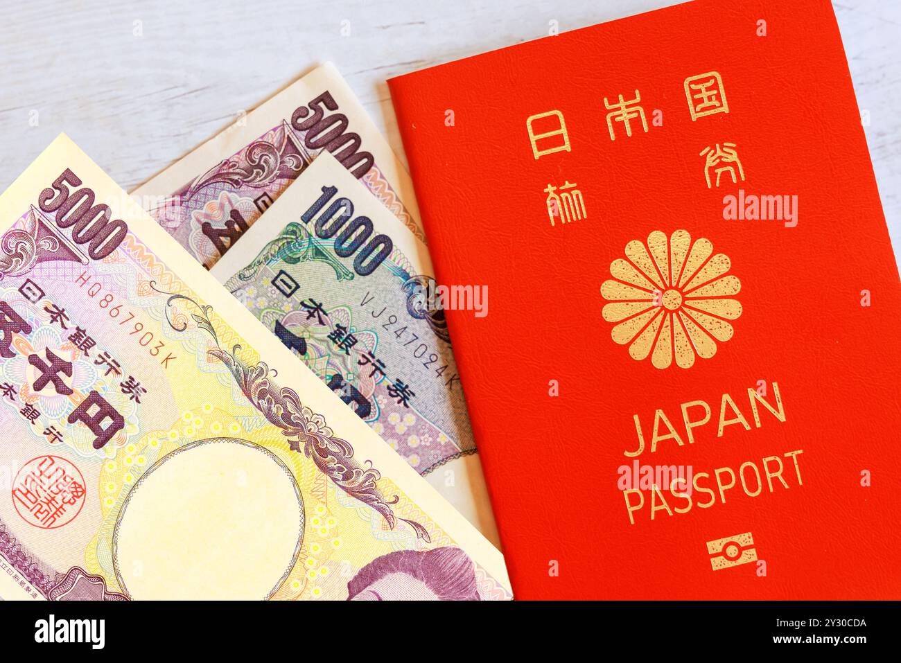 Japan passport, Japanese yen money banknotes, cash issued by Nippon ...