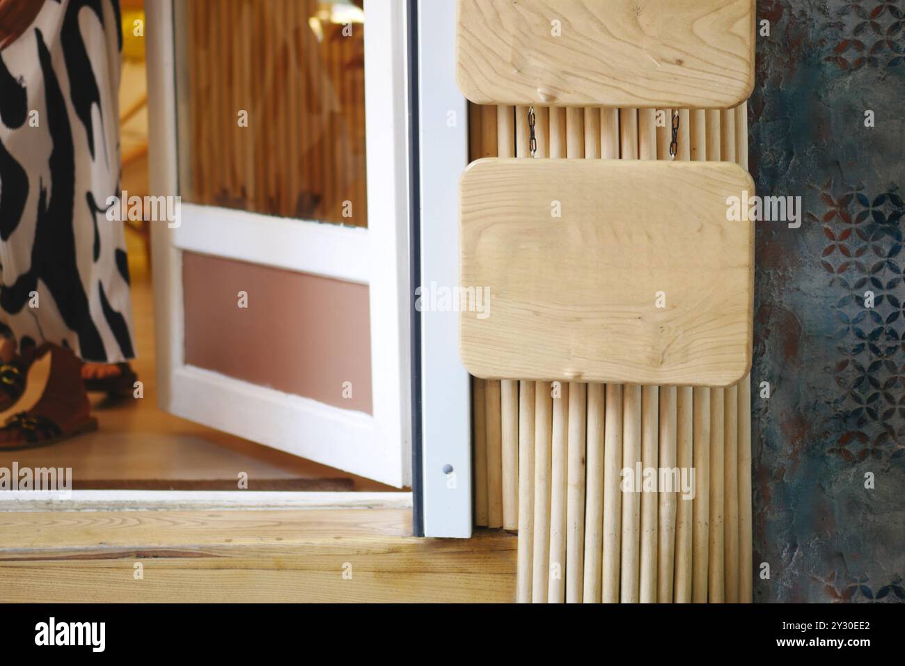 A stylish entryway showcasing unique wooden details along with an ...
