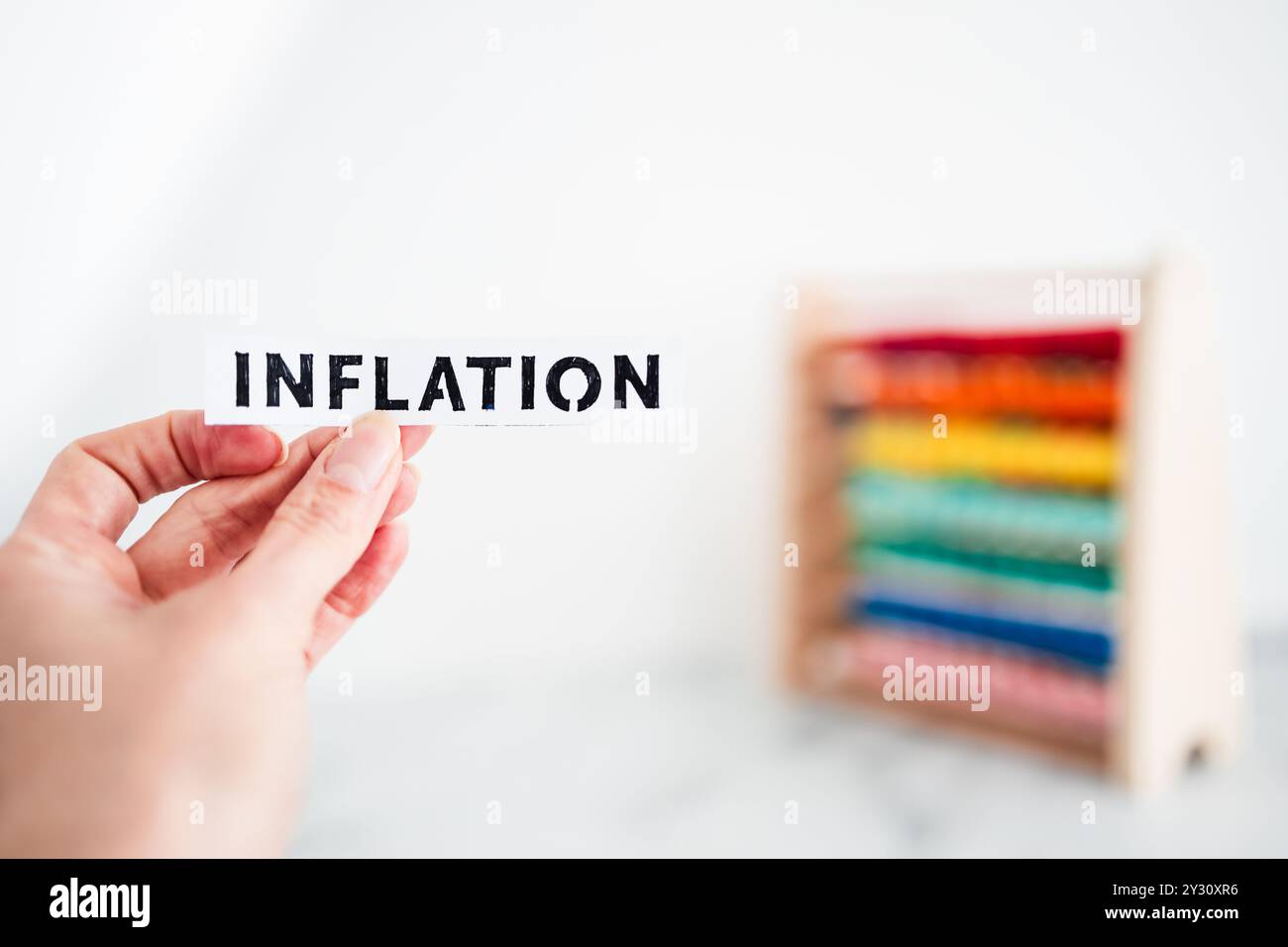 cost of living and recession conceptual image, hand holding Inflation ...