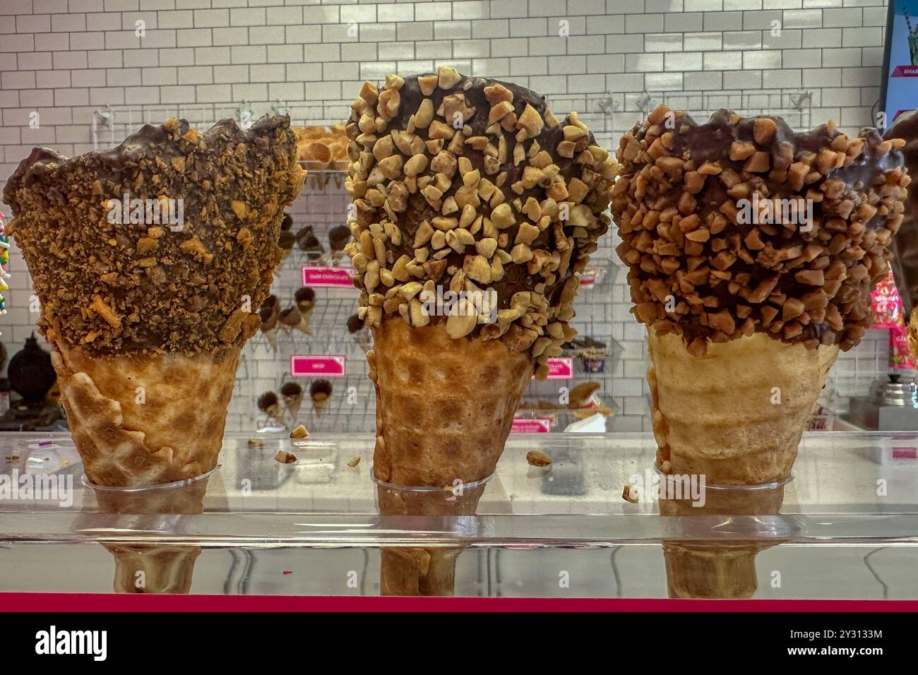 Ice cream cones on display in shop Stock Photo - Alamy