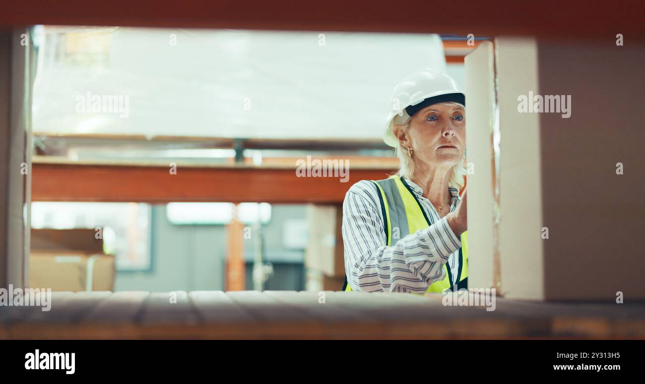 Mature woman, storage check and inspection at shelf with inventory ...