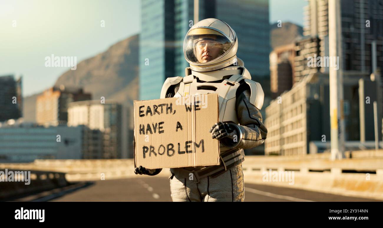 Person, astronaut and cardboard with helmet in city for dystopia ...