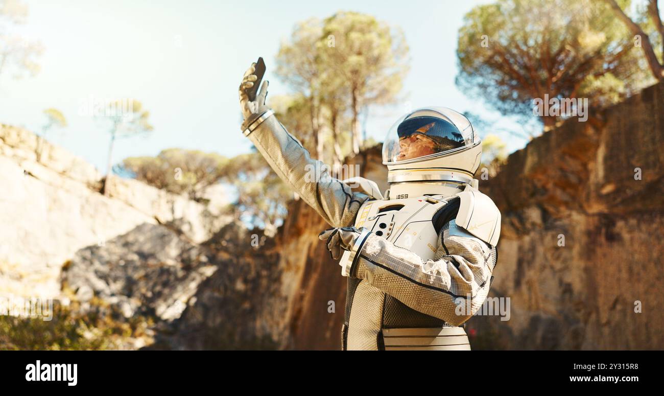 Astronaut, woman and phone for lost on planet outdoor with no signal ...