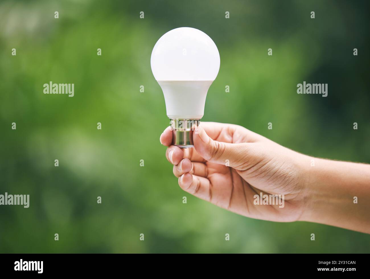 Hands, green and light bulb for eco friendly, sustainability and idea ...