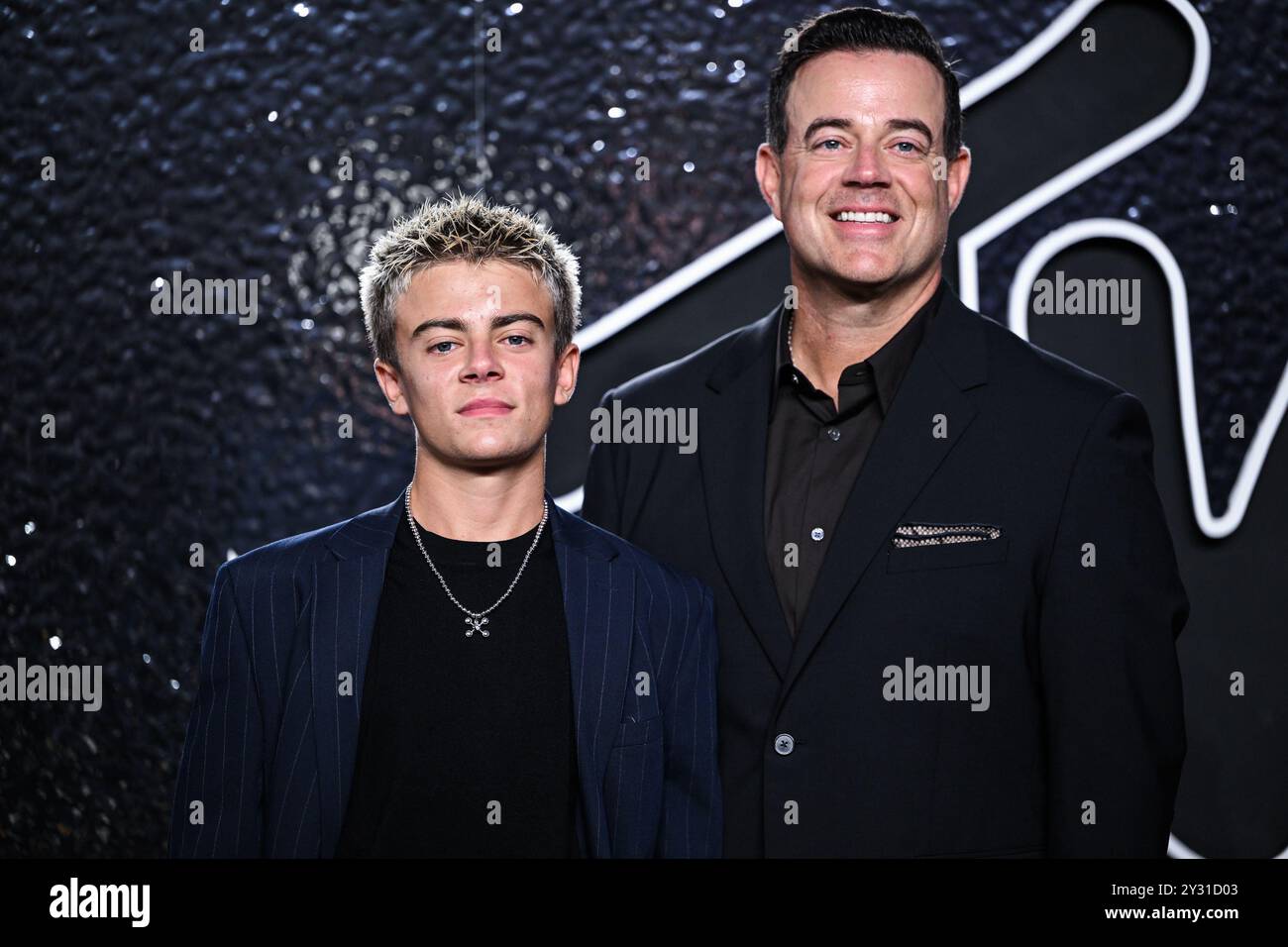 Elmont, USA. 11th Sep, 2024. Jackson Daly and Carson Daly walking on ...