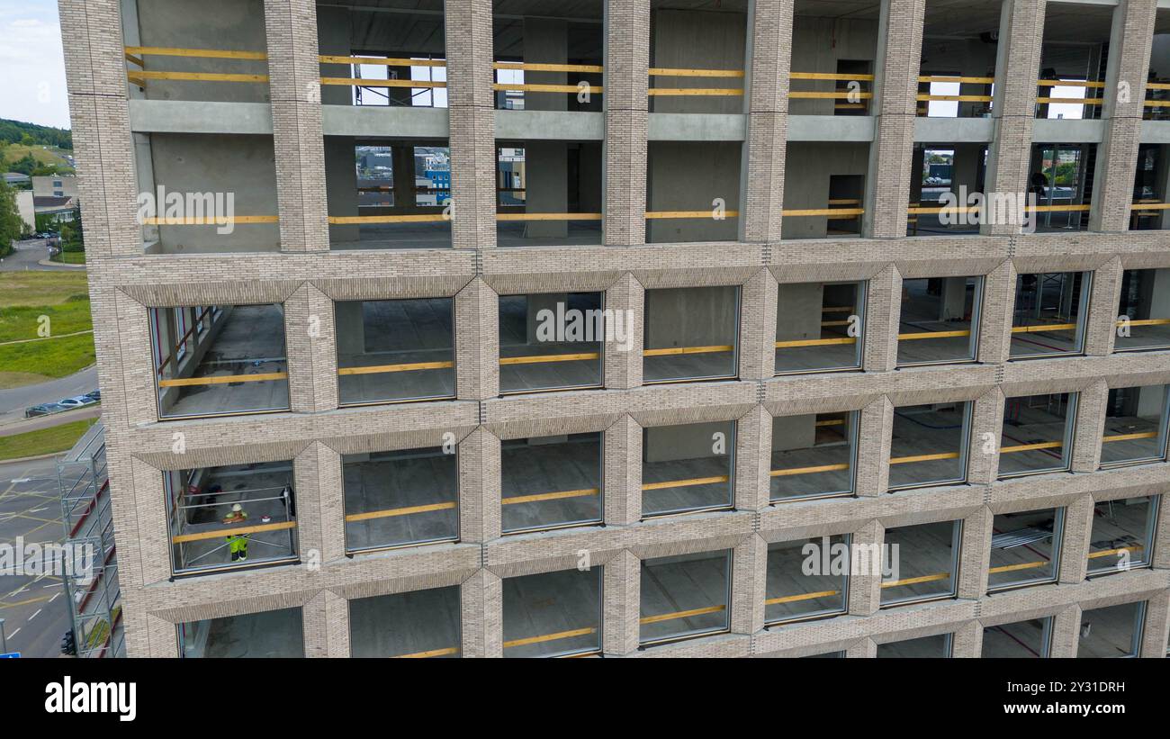A close-up view of a partially constructed building with a concrete ...