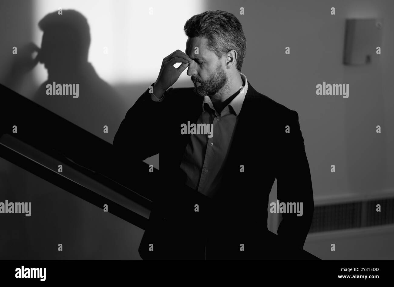 Man with sinus headache, tension or cluster headache, close up portrait ...