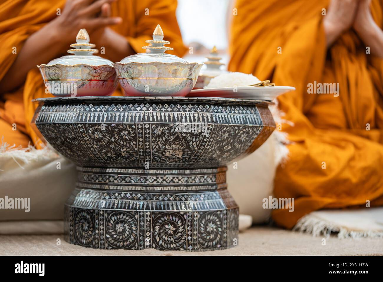 Thai bowl set arranged with rice, dishes on the small thai wooden table ...