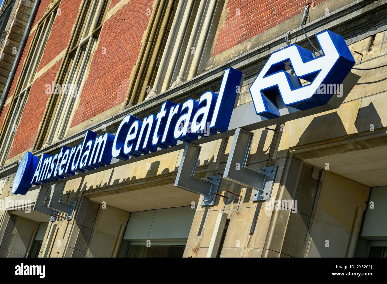 A close-up image of the sign at the front of Amsterdam Centraal Station ...