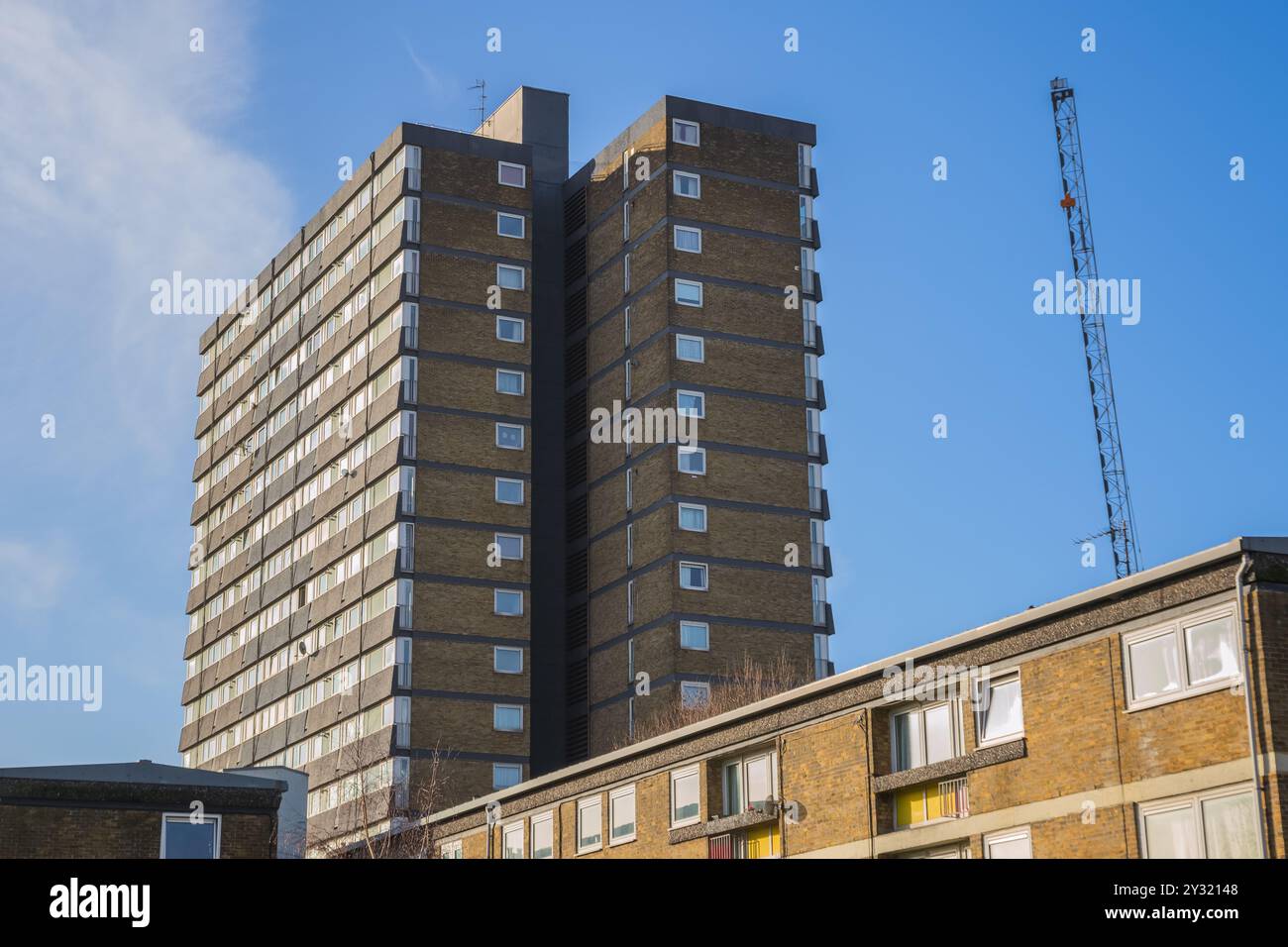 Council tower block and a crane in London, UK Stock Photo - Alamy