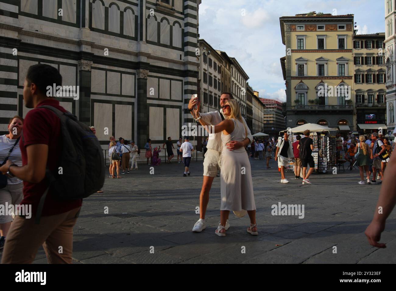 Florence, Italy. 11th Sep, 2024. A tourist couple take a self during ...