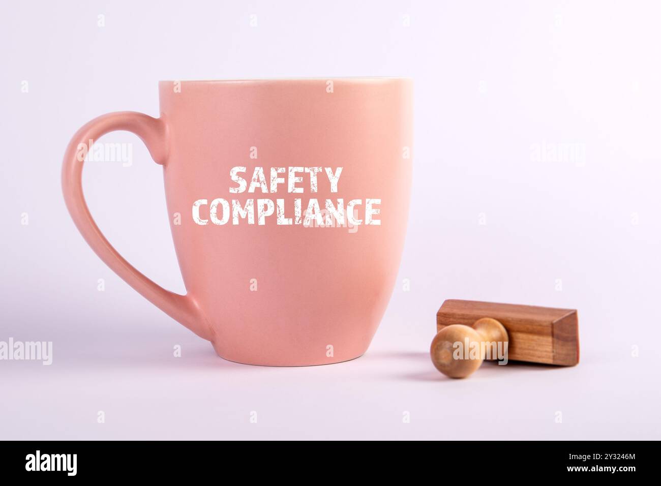 SAFETY COMPLIANCE. Coffee mug with text on a white background Stock ...
