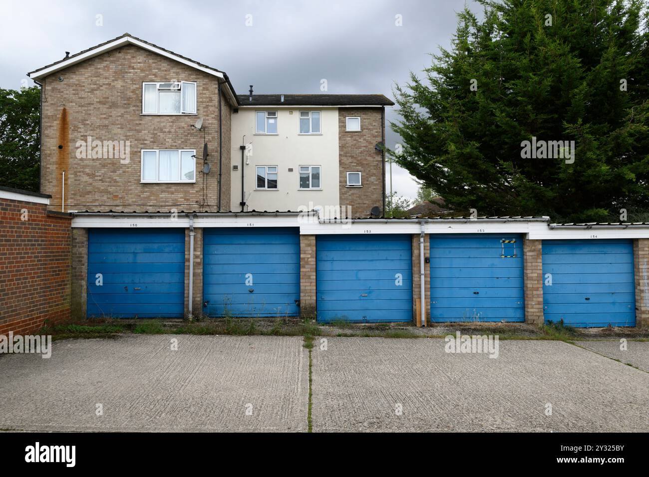 Garages with blue painted doors in a garage block off Saint Michael's ...