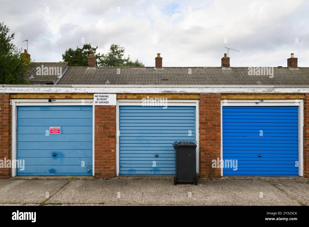 Garages with blue painted doors in a garage block off Saint Michael's ...