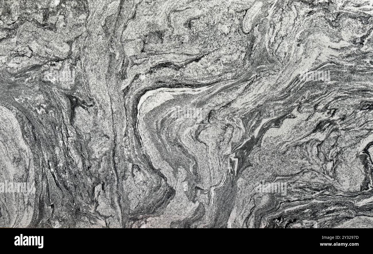 Close up of Viscount White natural granite slab. Grey, silver ...