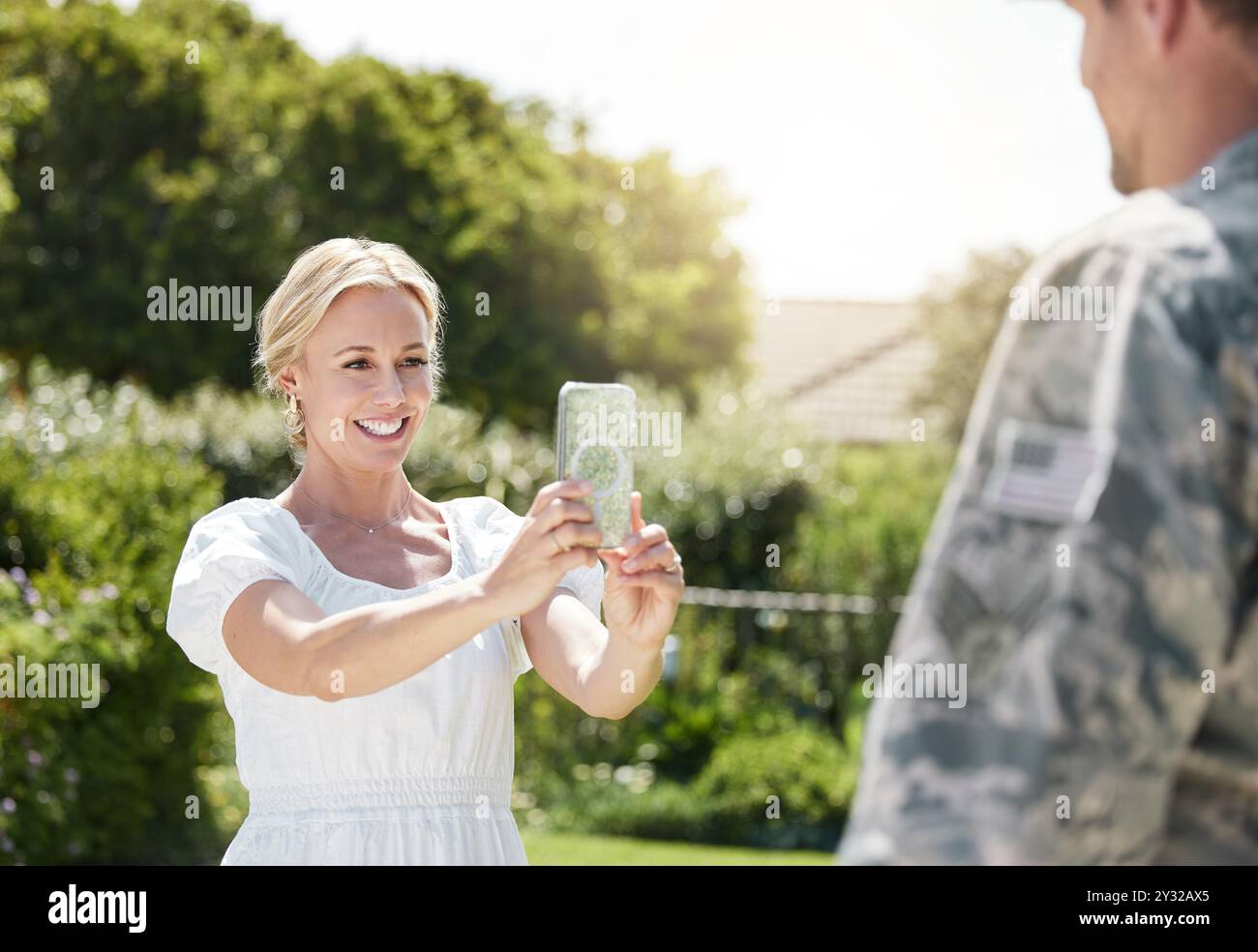 Phone, couple and happy woman take photo of soldier outdoor to ...