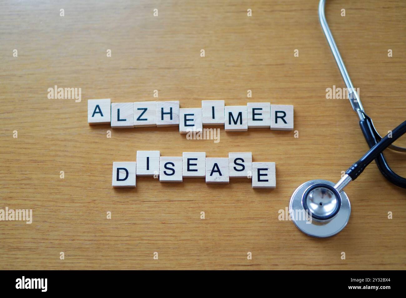 ALZHEIMER DISEASE. wooden letters with stethoscope Stock Photo - Alamy