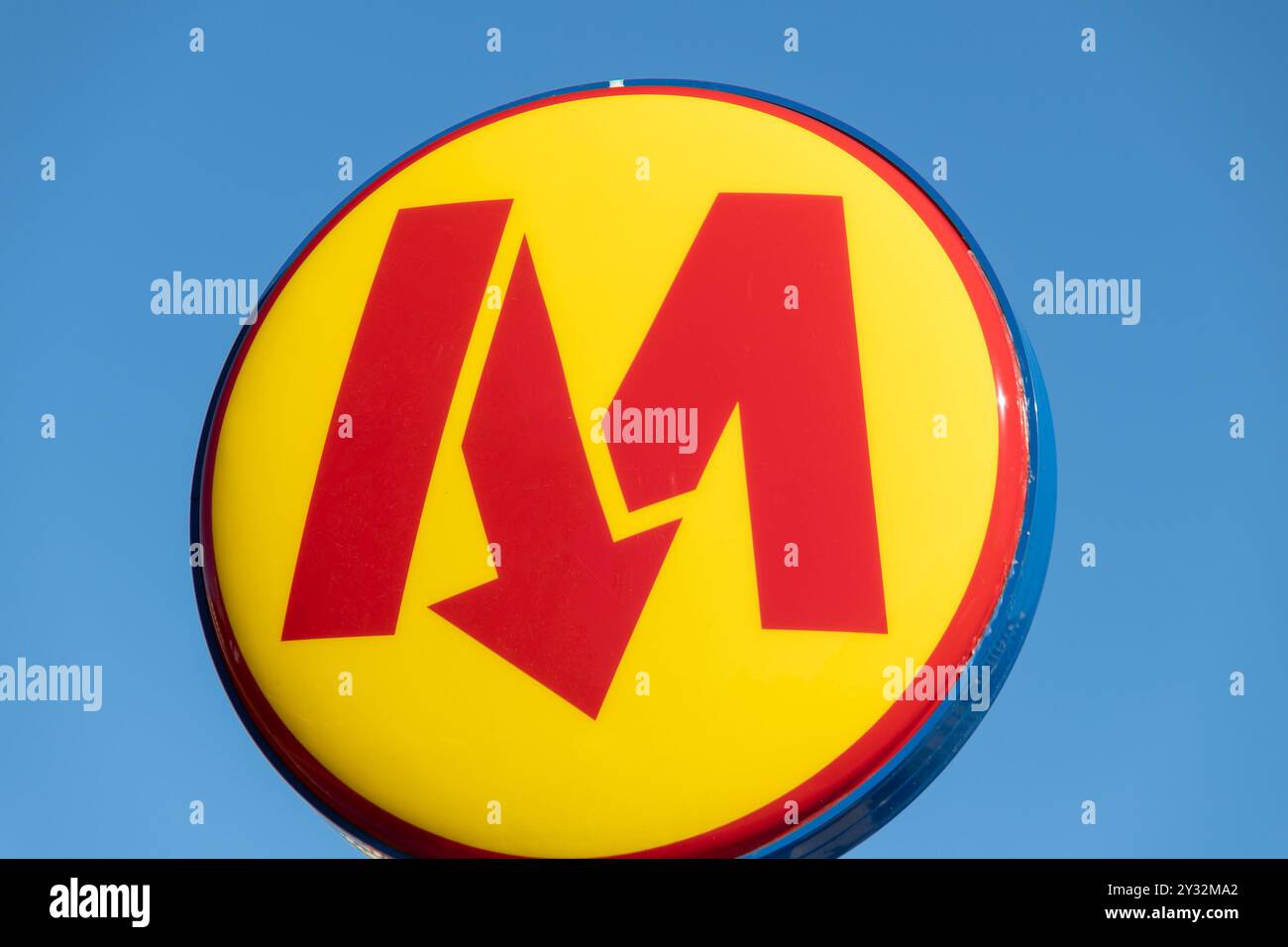 Warsaw Metro logo. Metro sign against blue sky. Warsaw, Poland. August ...