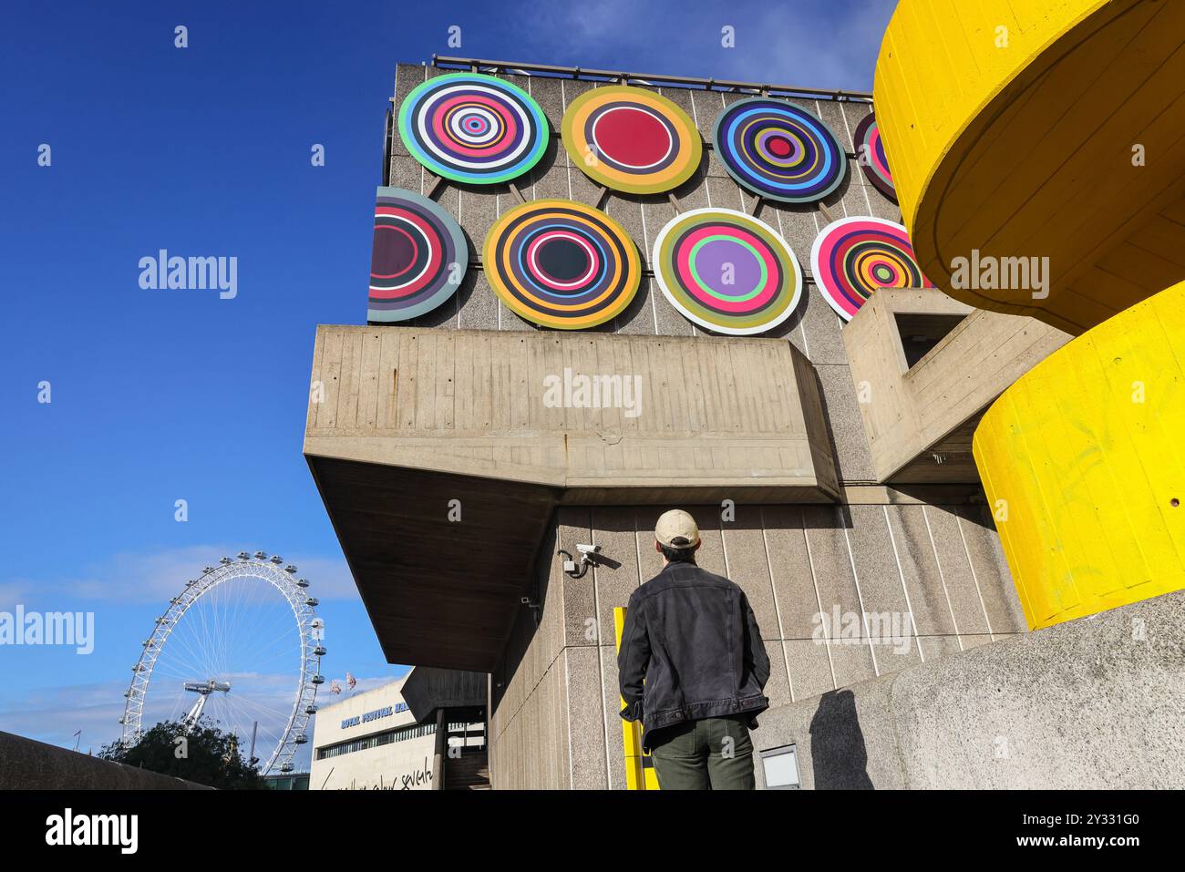 London, UK. 12th Sep, 2024. A member of staff poses with the work ...