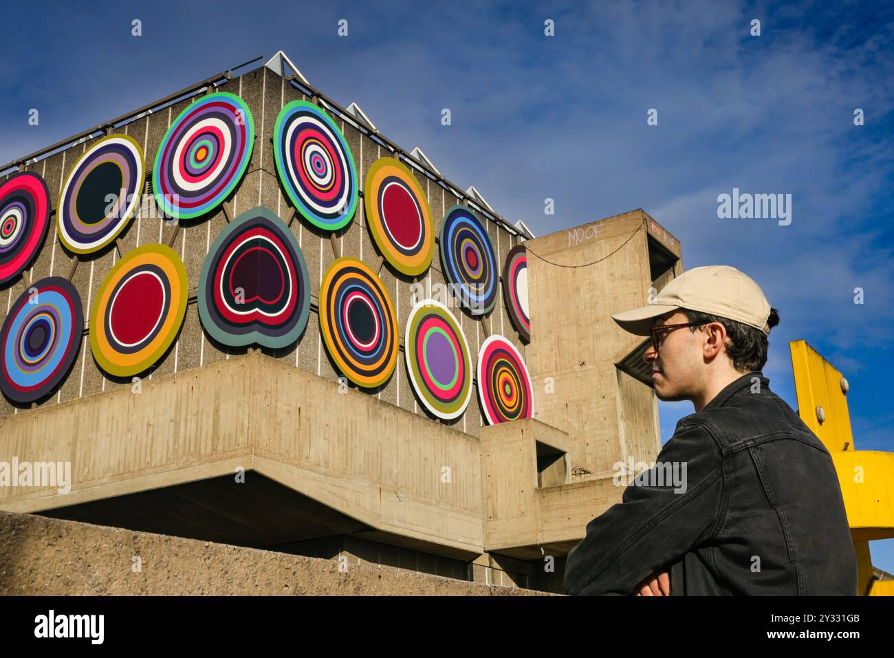 London, UK. 12th Sep, 2024. A member of staff poses with the work ...