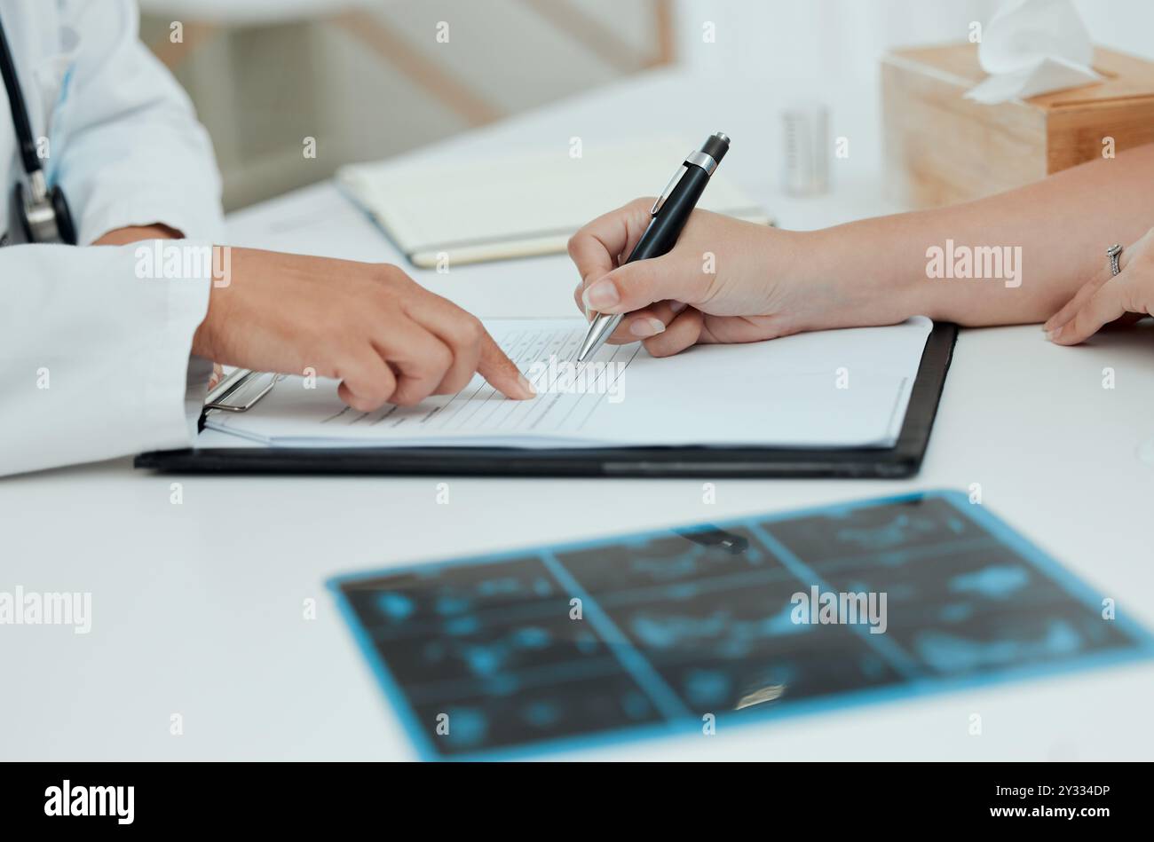 Hands, doctor and patient with paperwork for consultation, form or ...