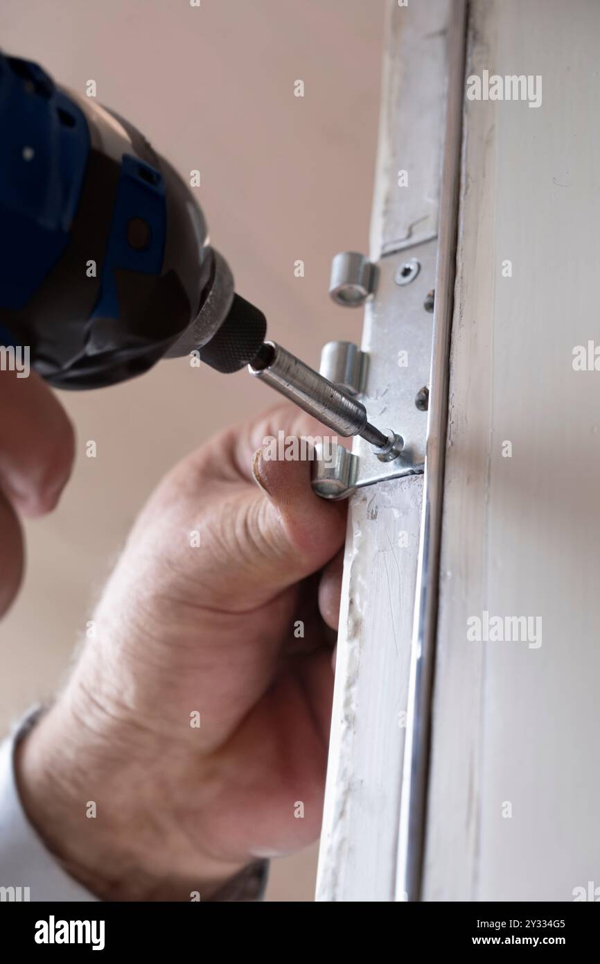 Man assembling wooden frame window hi-res stock photography and images ...