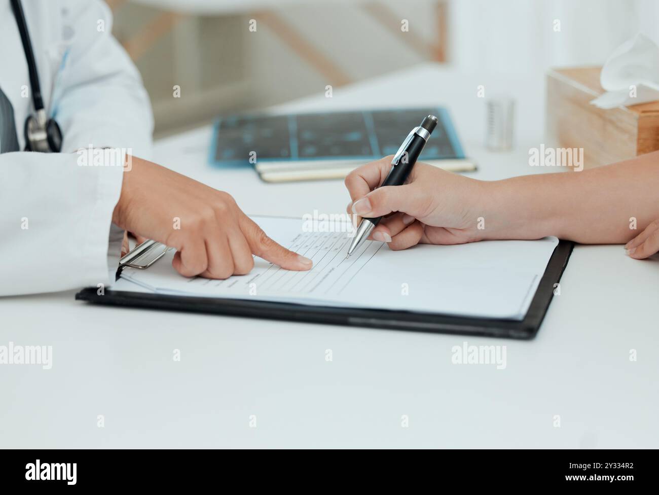 Hands, doctor and patient with paperwork for signature, form or ...