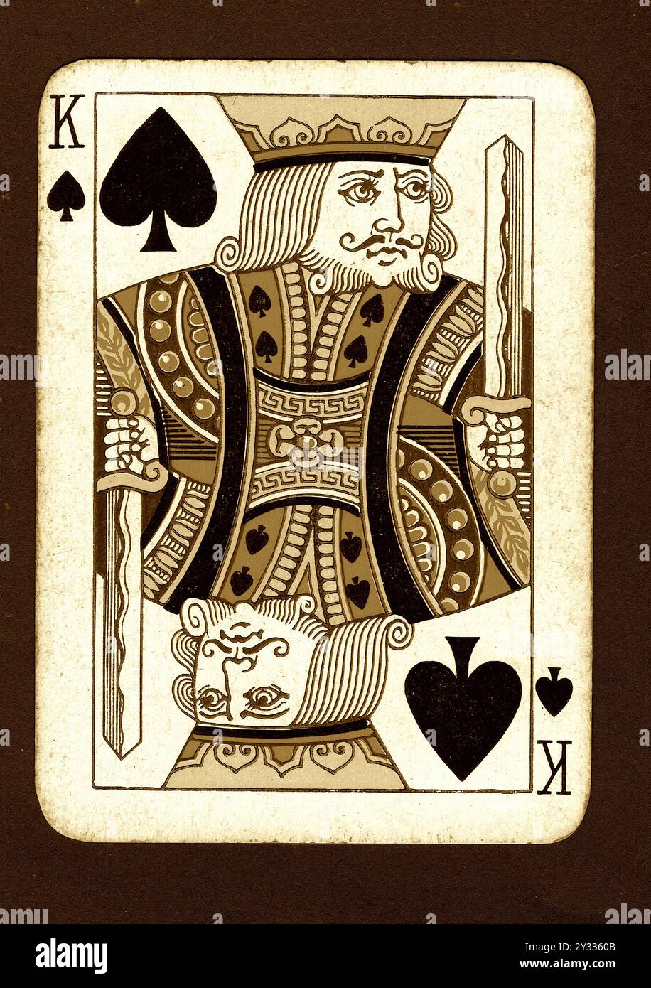 A vintage king of spades playing card in sepia on a black background Stock Photo - Alamy