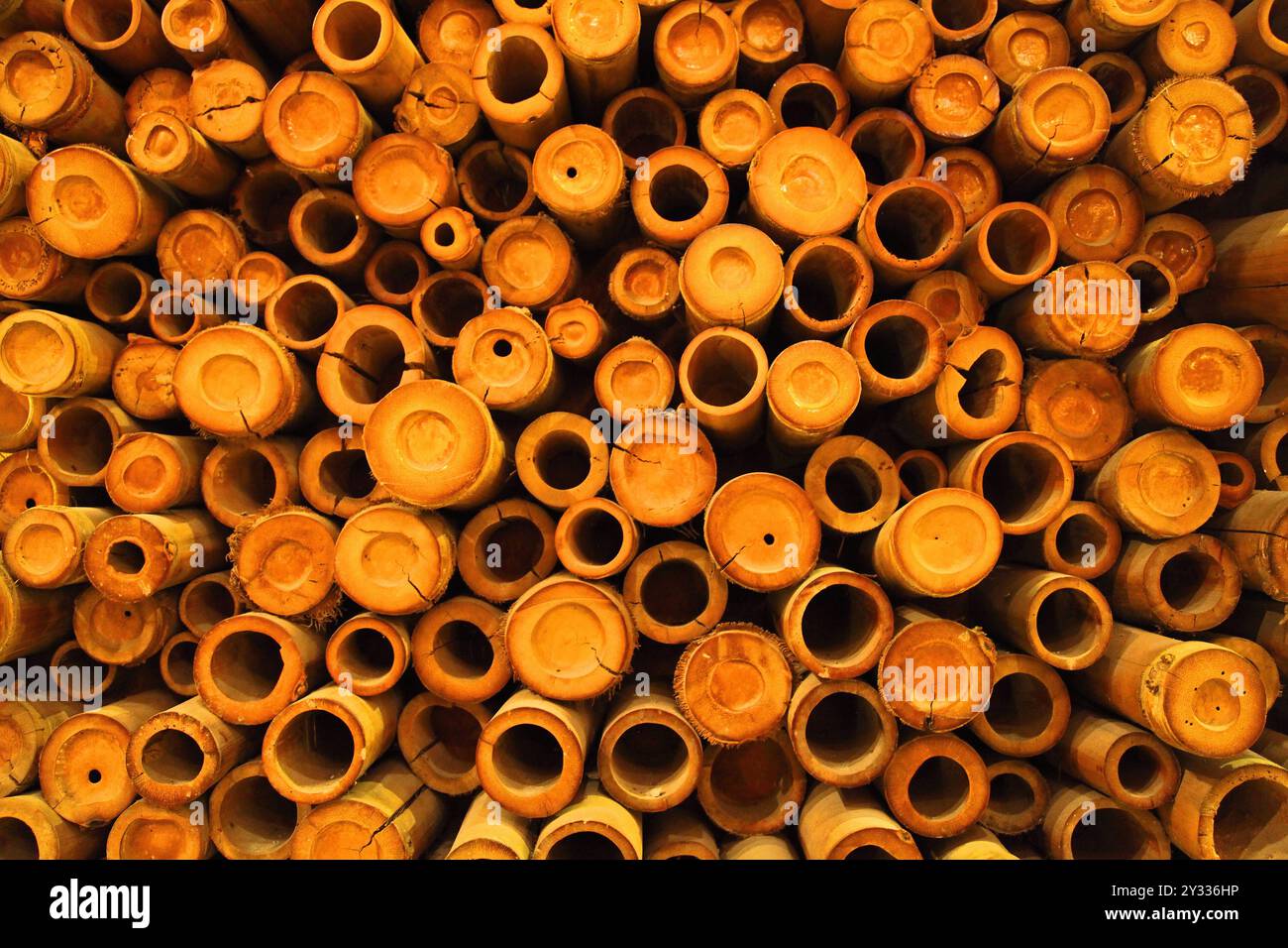 the ends of stacked and dried up cut bamboo background decoration ...