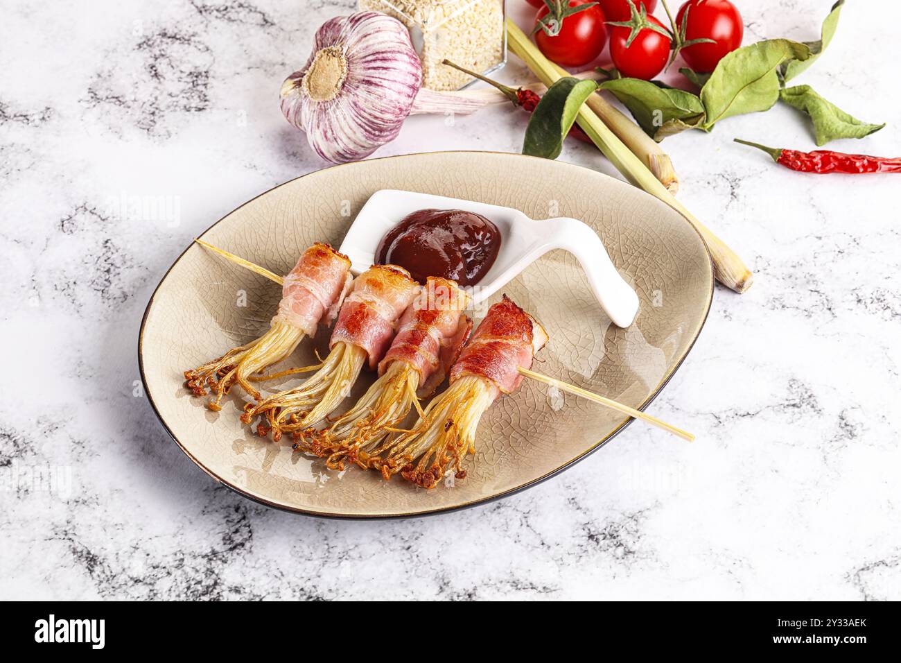 Tasty Grilled enoki mushroom with bacon Stock Photo - Alamy