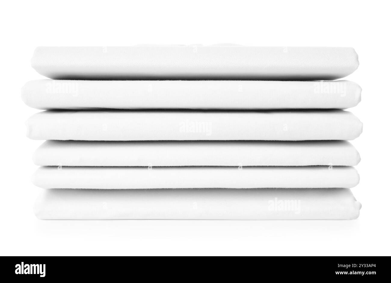 Stack of clean t-shirts isolated on white Stock Photo - Alamy