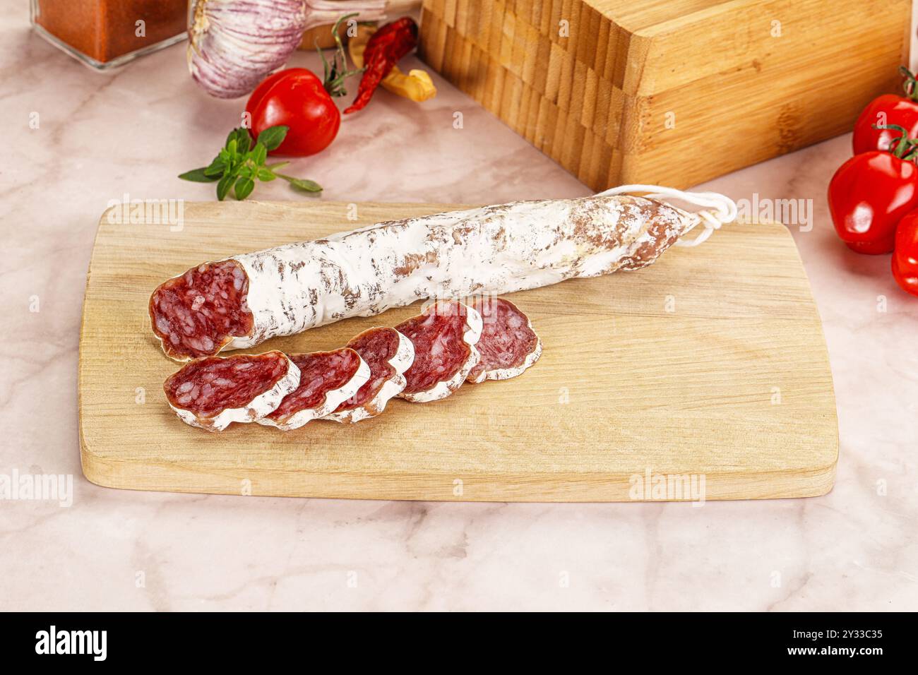 Spanish dry pork salami sausage Fuet Stock Photo - Alamy