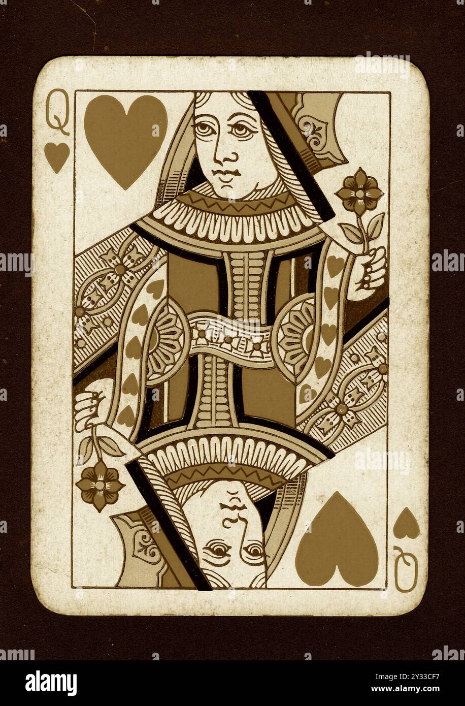 A vintage queen of hearts playing card in sepia on a black background ...