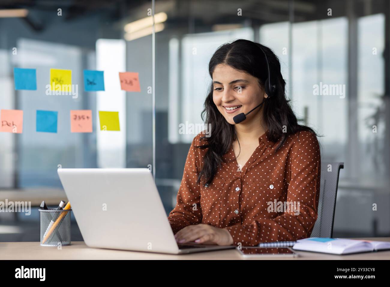 Tech support agent typing laptop hi-res stock photography and images ...