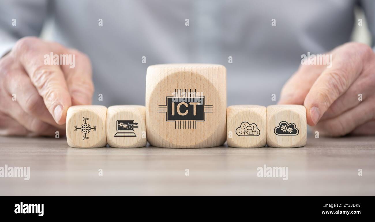 Wooden blocks with symbol of ict concept Stock Photo - Alamy