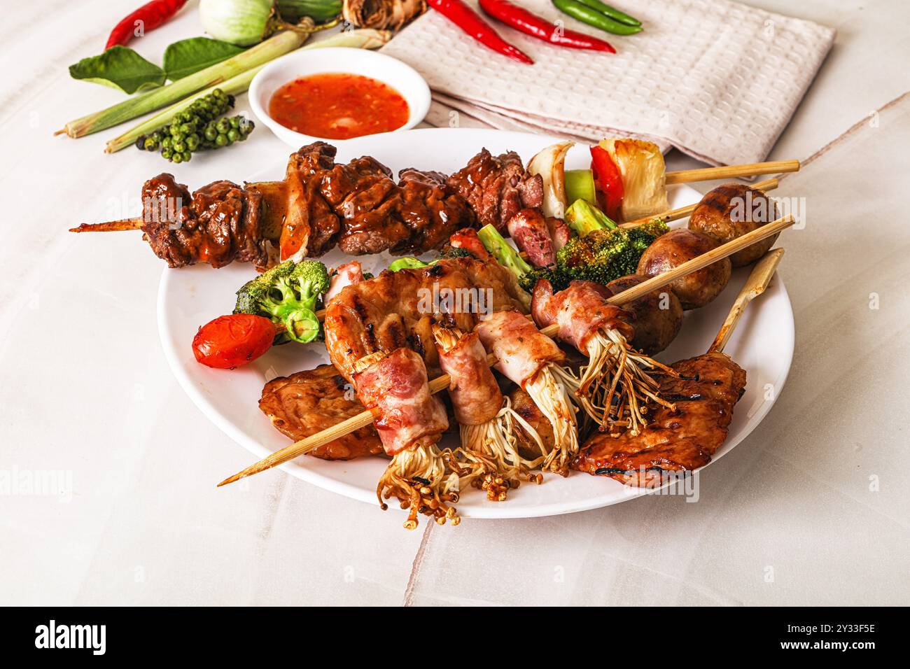 Asian grilled skewer assortment satay with beef, porl, chicken and ...