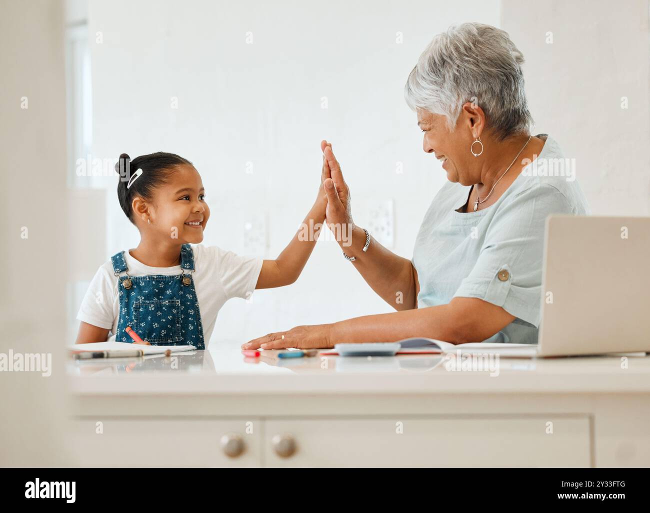 Teaching, high five and homework with grandma and child for education ...