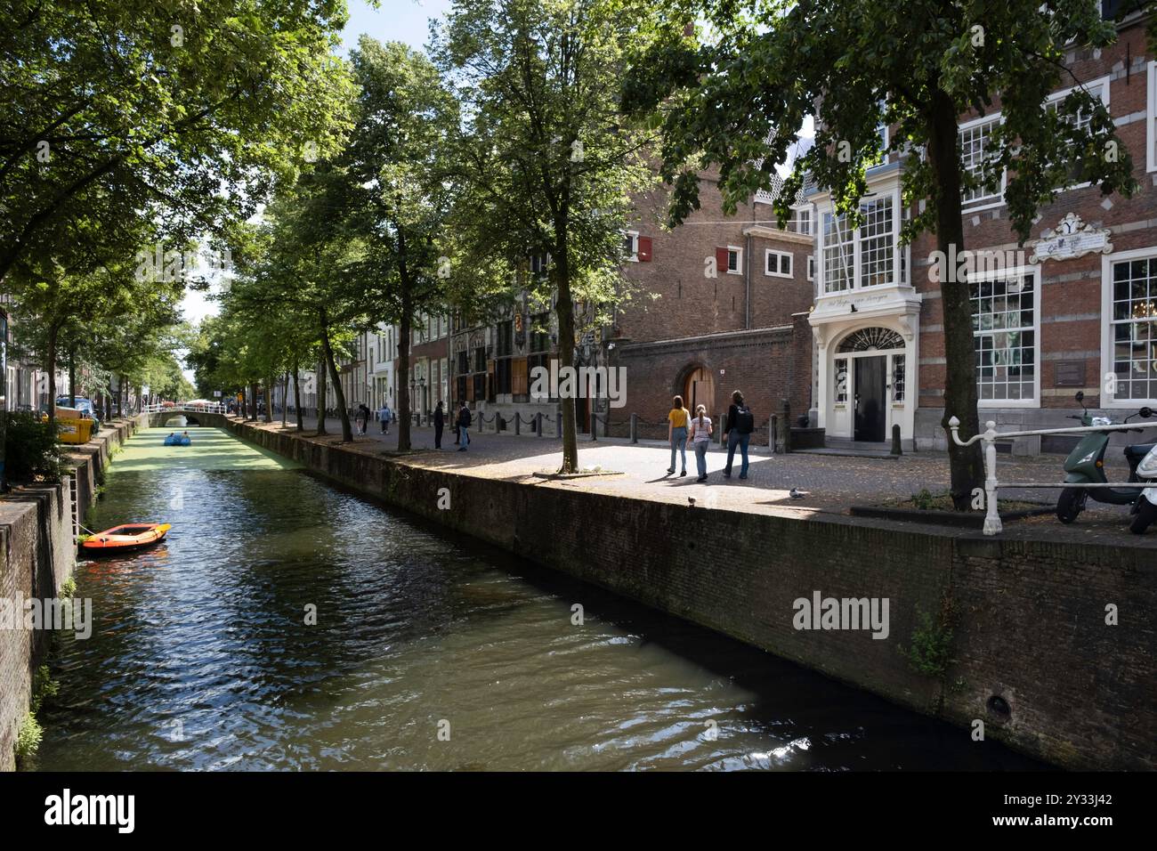Houses with a canal on the 'Oude Delft' street with the facade of the ...