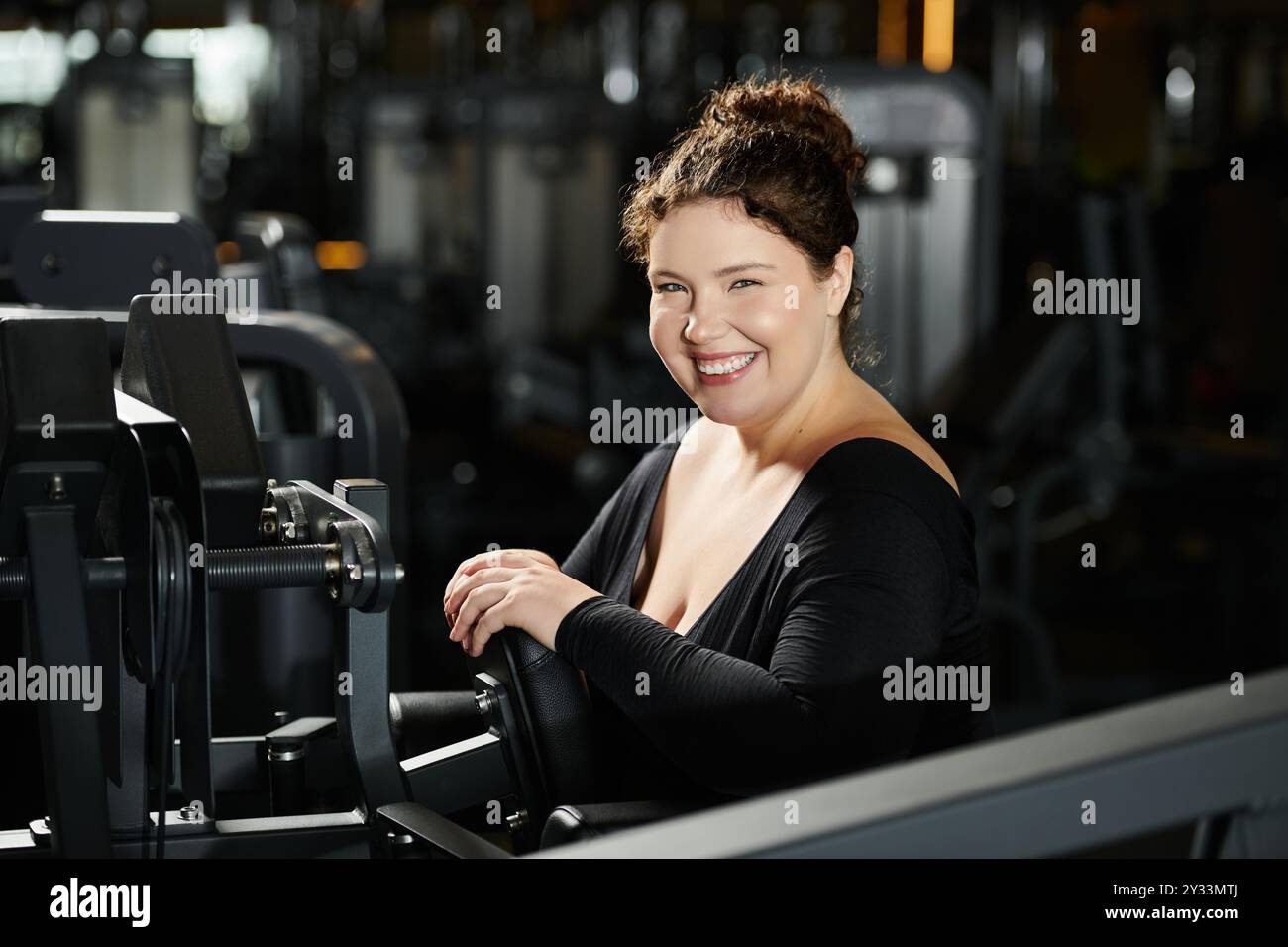 A young woman embraces body positivity, enjoying her workout session in ...
