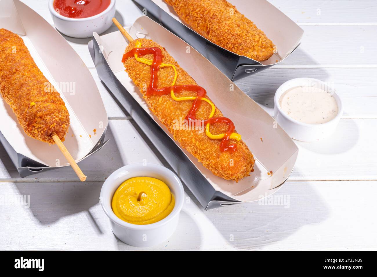 Traditional american, mexican corn dog with sauces - ketchup, mayo ...