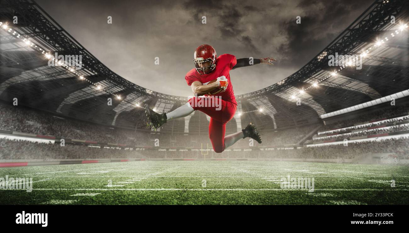 Football player in red uniform is caught mid-air as he leaps high ...