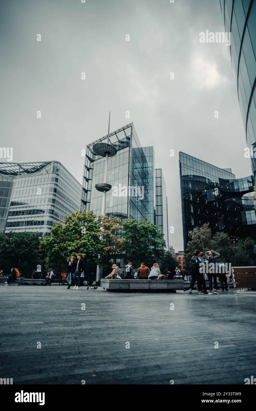 Square outside buildings near Tower Bridge in London, UK Stock Photo ...