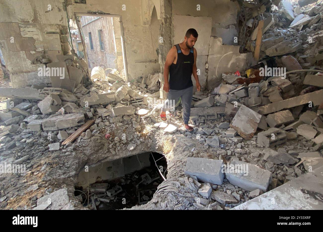A view shows destruction of the Al-Dahduh apartment building, part of ...