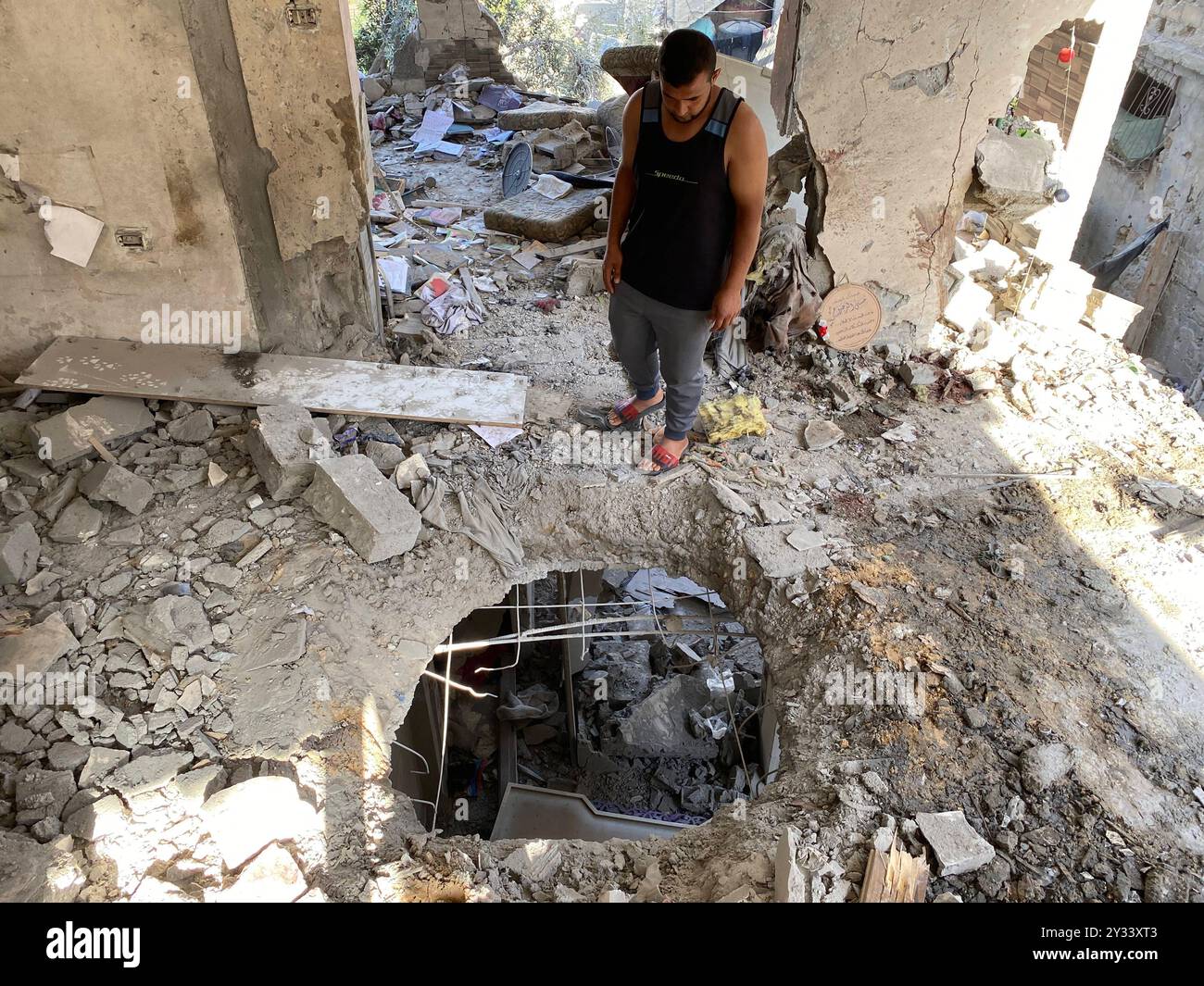 A view shows destruction of the Al-Dahduh apartment building, part of ...