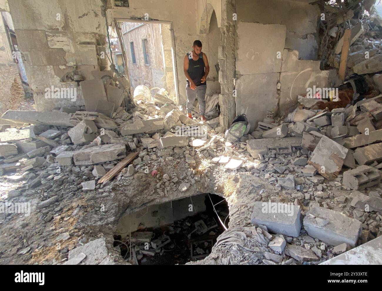 A view shows destruction of the Al-Dahduh apartment building, part of ...